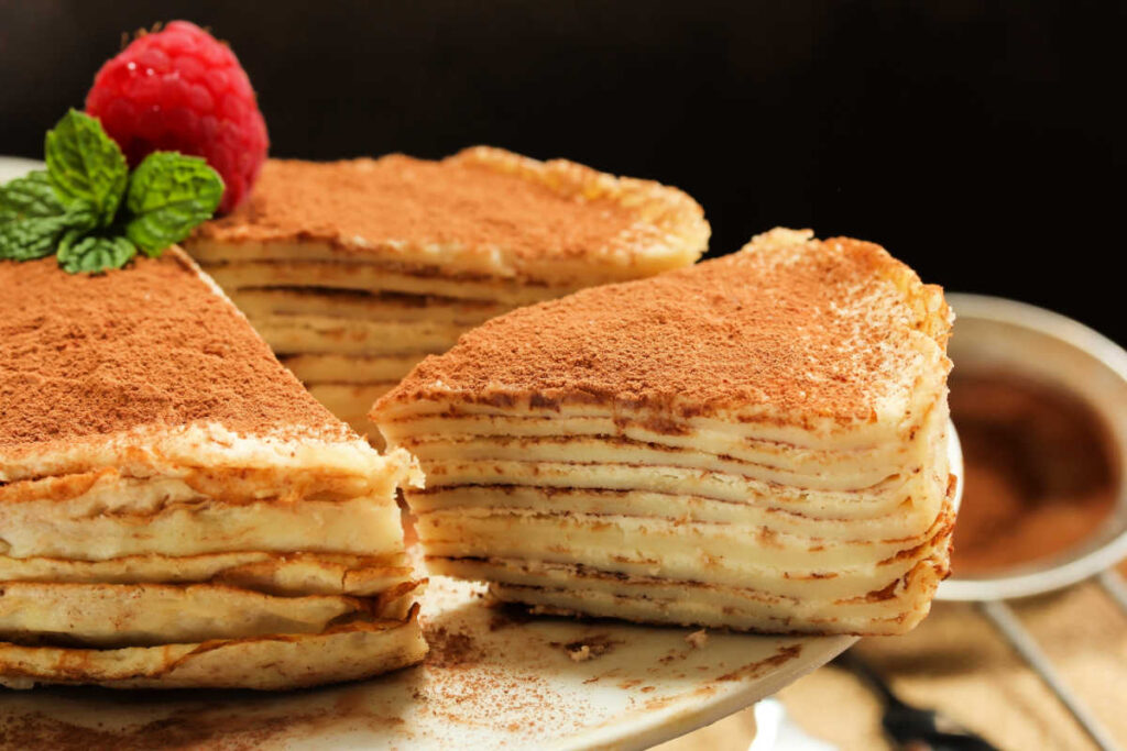 Stacked Tiramisu Crepe Cake: A Delicious Twist - Eats by the Beach